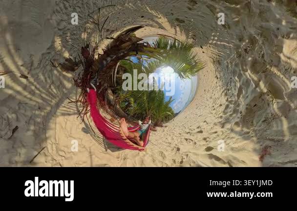 Tropical Island Relaxation, Man Resting in Red Hammock on Sandy Beach ...