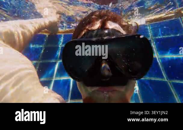 Underwater Close Up Of Man With Diving Mask Blowing Air Bubbles Against ...
