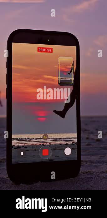 Vertical video. Smartphone Recording Couple Approaching Camera After ...