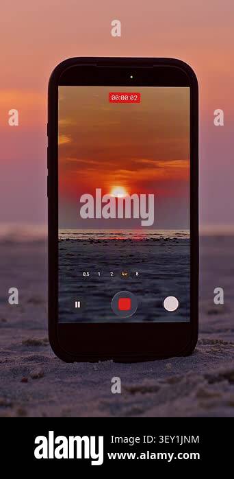 Vertical video. Smartphone Recording Woman Jumping into Man Arms on ...
