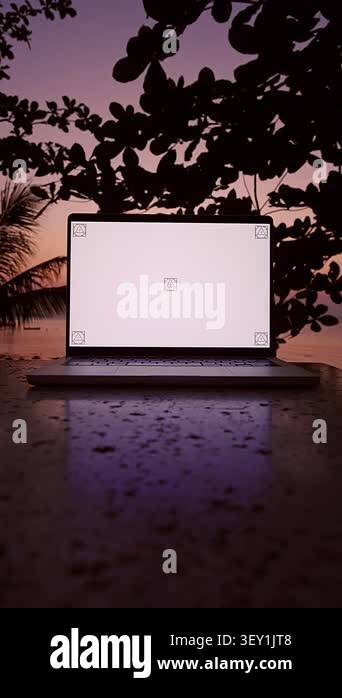 Vertical video. Laptop With Blank Screen On Stone Table Against ...
