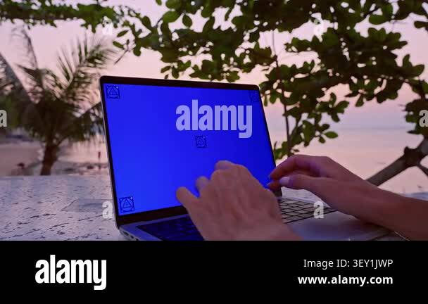 Woman Typing on Laptop with Blue Screen Mockup and Closing Device at ...