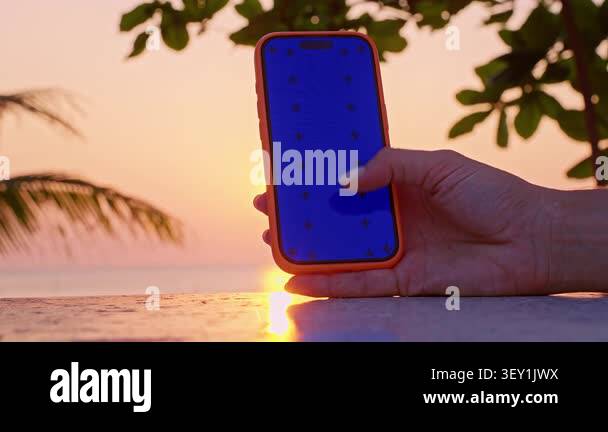Hand Holding Smartphone with Blue Screen Mockup Template Performing ...