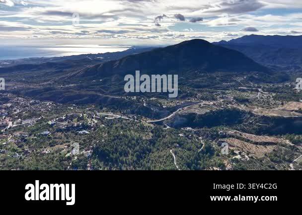 Coastal mountain overlook sunrise view, aerial scout frames ridge, bay ...