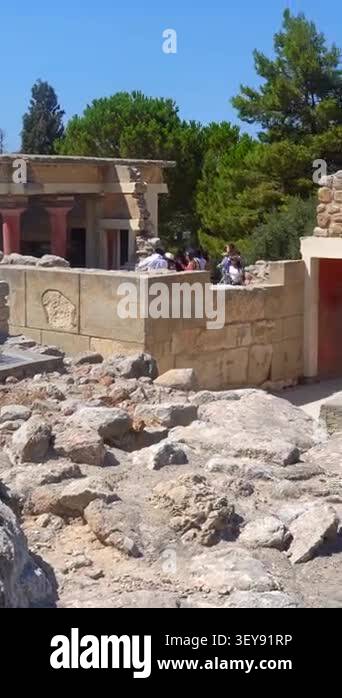 Slow motion pan of the historical ruins at the Palace of Knossos in ...