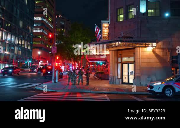 Washington, USA, 13 June 2026: Night street scene with military ...