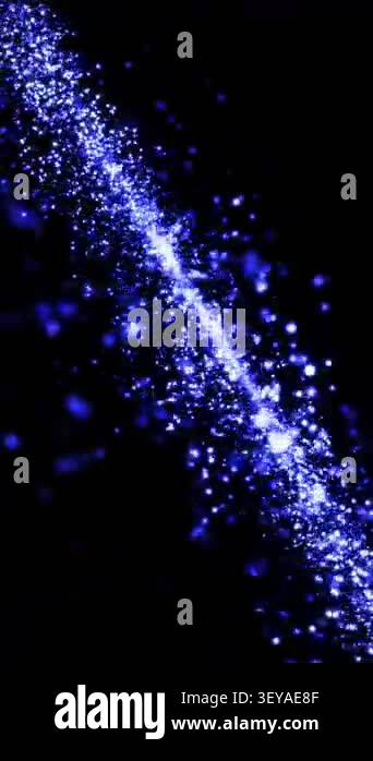 Shimmering magic blue glitter stream flowing diagonally across a dark ...