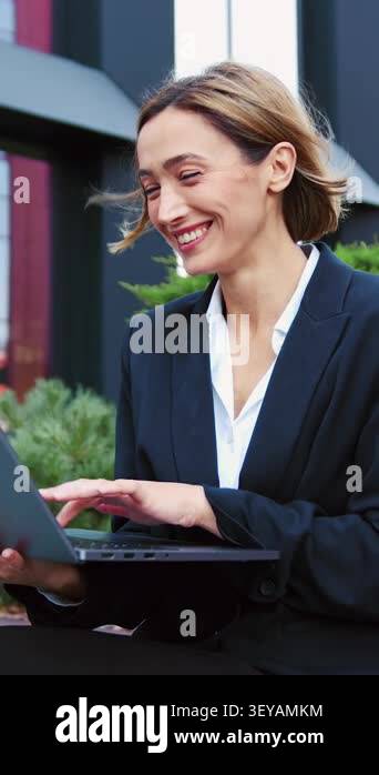 Elegant woman freelancer browsing surfing internet Businesswoman typing ...