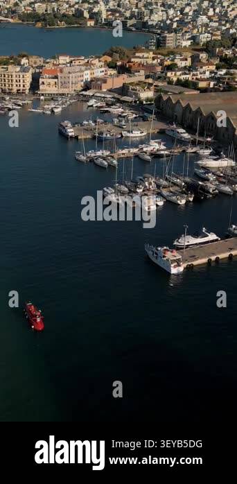 Aerial view of the Old Venetian Port of Chania with breakwater, marina ...