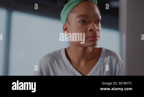 Portrait face of beautiful concentrated african american casual girl ...