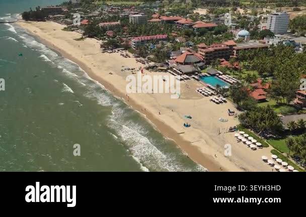 Aerial shot of surfers on calm but windy sea Stock Video Footage - Alamy