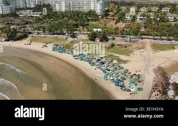 Aerial shot of active kitesurfers moving across the sea in Mui Ne Stock ...