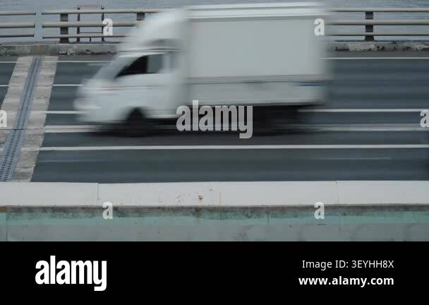 Fast moving cars with motion blur on city highway Stock Video Footage ...