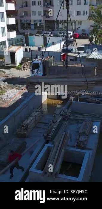 Worker guides wooden planks during loading process Stock Video Footage ...