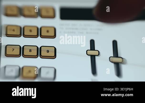 Input console displaying a set of controls for managing system alarms ...