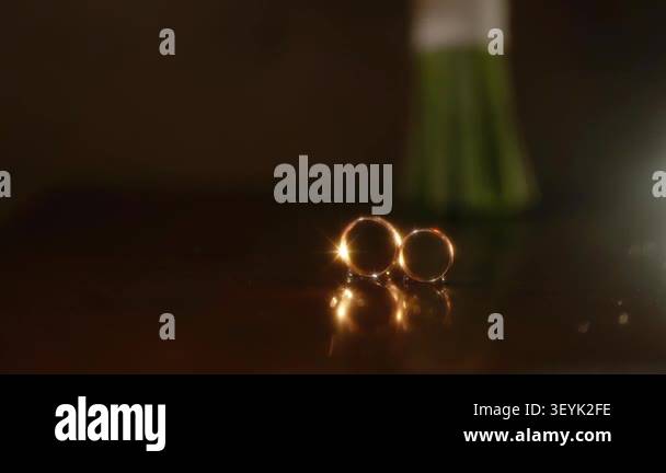 close-up of the wedding rings of the bride and groom before the outdoor ...
