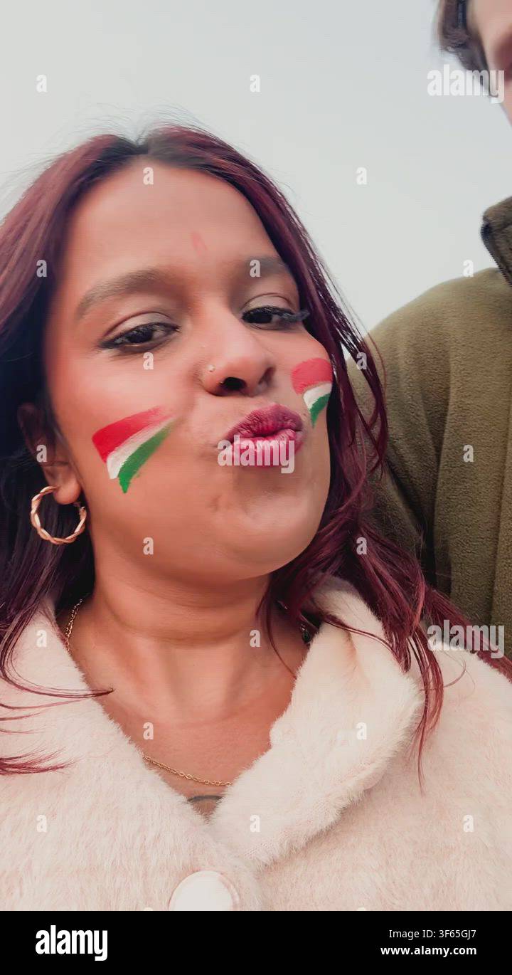 Couple Walks Outdoors With Face Paint Showing Indian Flag Stock Video ...