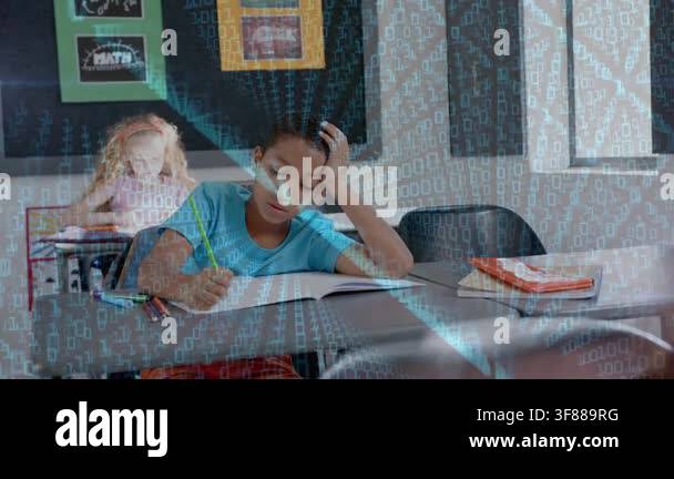 Boy writing book with green pencil, pausing, turning right after sound ...