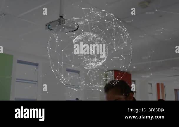 Projector projecting network globe overlay, student handling paper ...