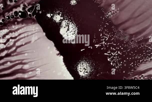 Dark and light patterns blend together in an abstract design. The ...