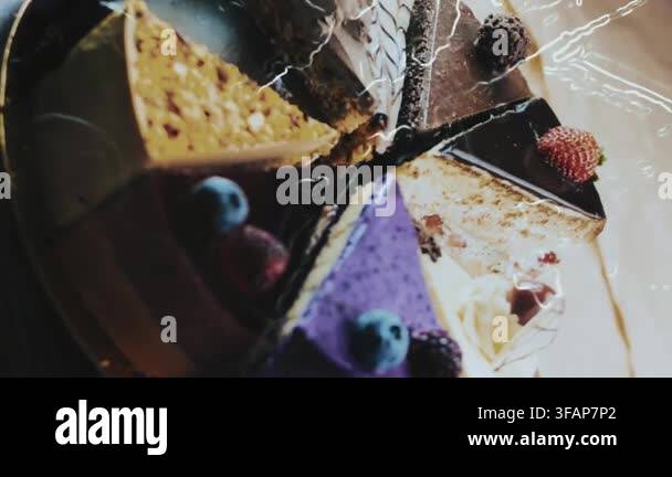 Careful top down recipe styling individual cakes for a bakery display ...