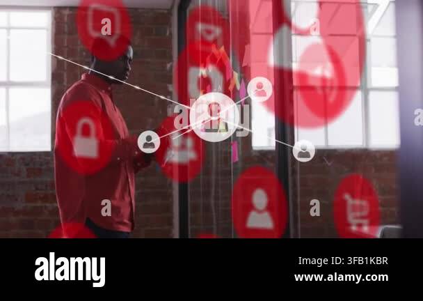 Animation of network of connections with icons over african american ...