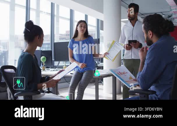 Woman leading at desk pointing charts, sparking green finance icons ...