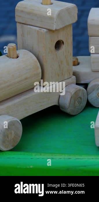 Collection of handmade wooden toy vehicles including cars, trucks ...