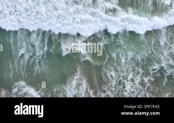 Ocean water flowing forward. Sea surf washing the beach. Ocean waves ...