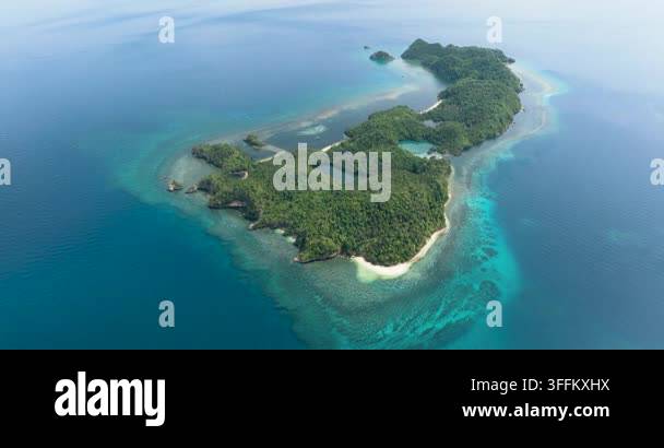 Aerial view of tropical island in the blue sea with sandy beach ...