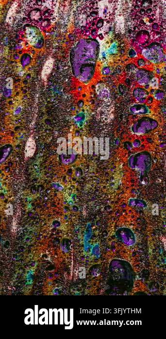 A vibrant and abstract close-up of a concrete surface displaying a ...