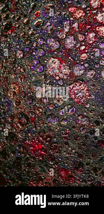 Detailed close-up of a vibrantly colored concrete texture with an ...