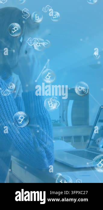 Animation of bitcoin symbols over businesswoman using phone headset and ...