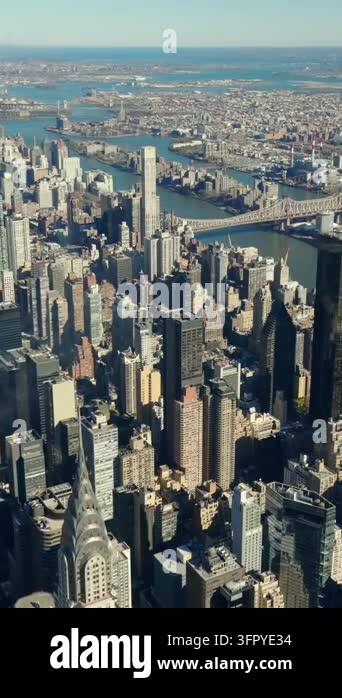 Vertical video: Cityscape from height. High rise buildings and ...