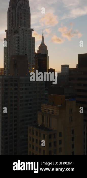 Vertical video: High rise office and apartment buildings in city at ...