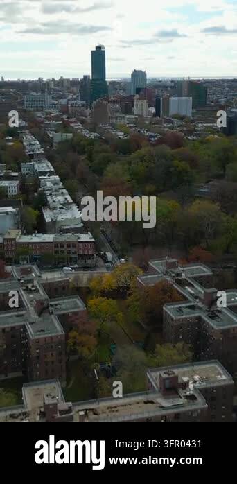 Vertical video: Aerial panoramic view of residential urban borough in ...