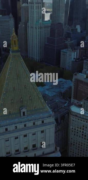 Vertical video: Aerial view of Manhattan Municipal Building in downtown ...
