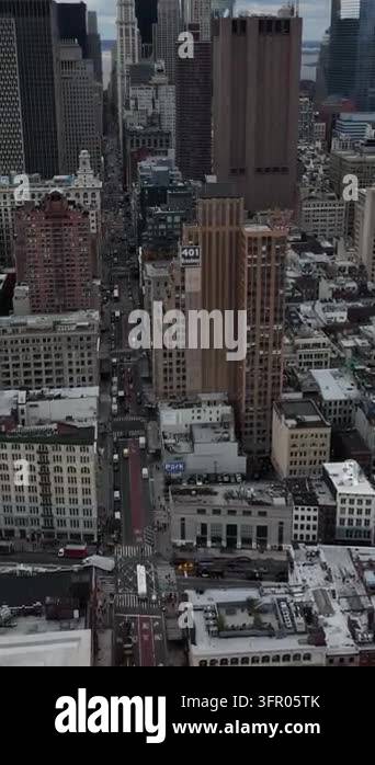 Vertical video: Aerial footage of high rise downtown buildings. Wide ...