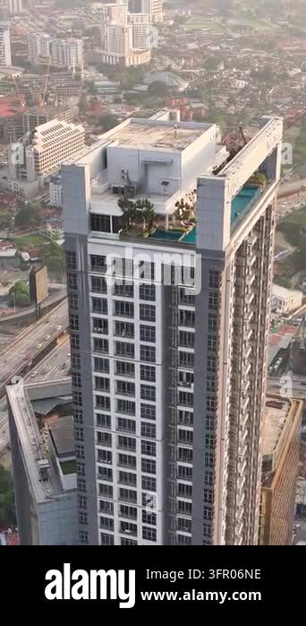 High-angle view of a rooftop swimming pool on a modern high-rise ...