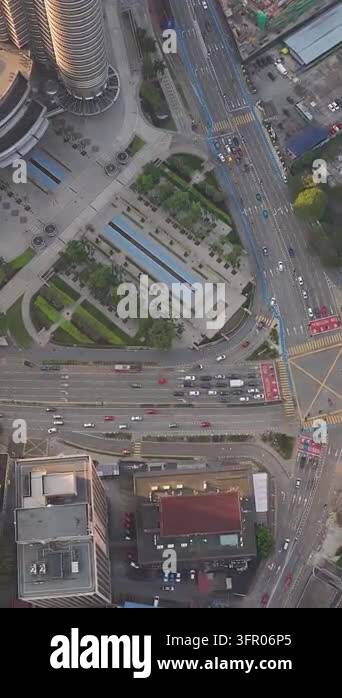 High-angle view shows multilane traffic, marked crossings, landscaped ...