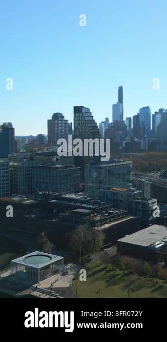 Vertical video: Aerial footage of modern high rise buildings in ...