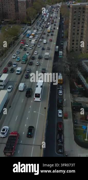 Vertical video: High angle view of busy elevated multilane highway ...