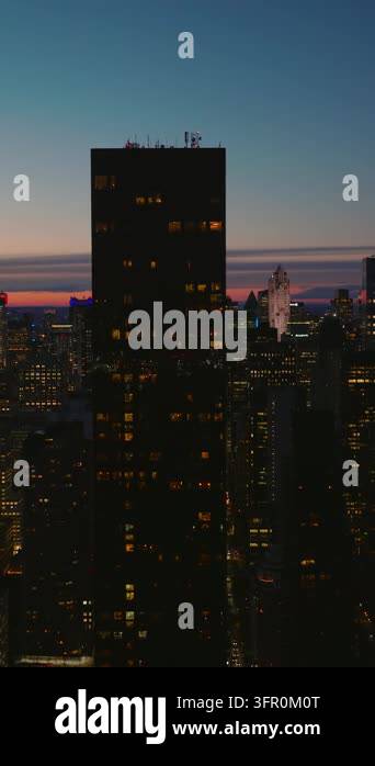 Vertical video: Slider of high rise buildings and streets in downtown ...