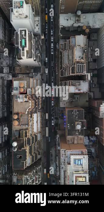 Vertical video: High angle view of high rise buildings in midtown. Town ...
