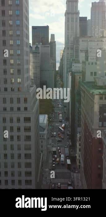 Vertical video: Rising shot of high rise downtown buildings. Tall ...