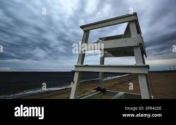 NORWALK, CT, USA - SEPTEMBER 20, 2026: A white wooden lifeguard tower ...