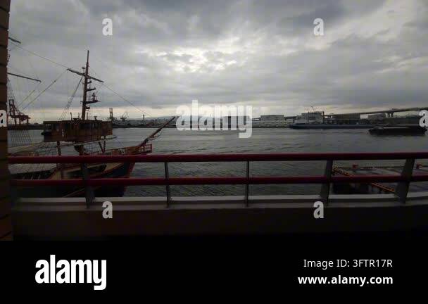 Osaka, Japan - September 16, 2026: Cargo Ship and Tourist Pirate Ship ...