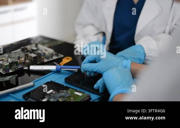 technician repairing computer in workshop Stock Video Footage - Alamy