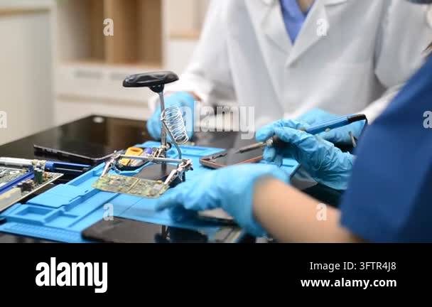 technician repairing computer in the workshop Stock Video Footage - Alamy