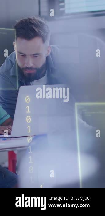 Vertical video: Teacher leaning over laptop as student typing, guiding ...
